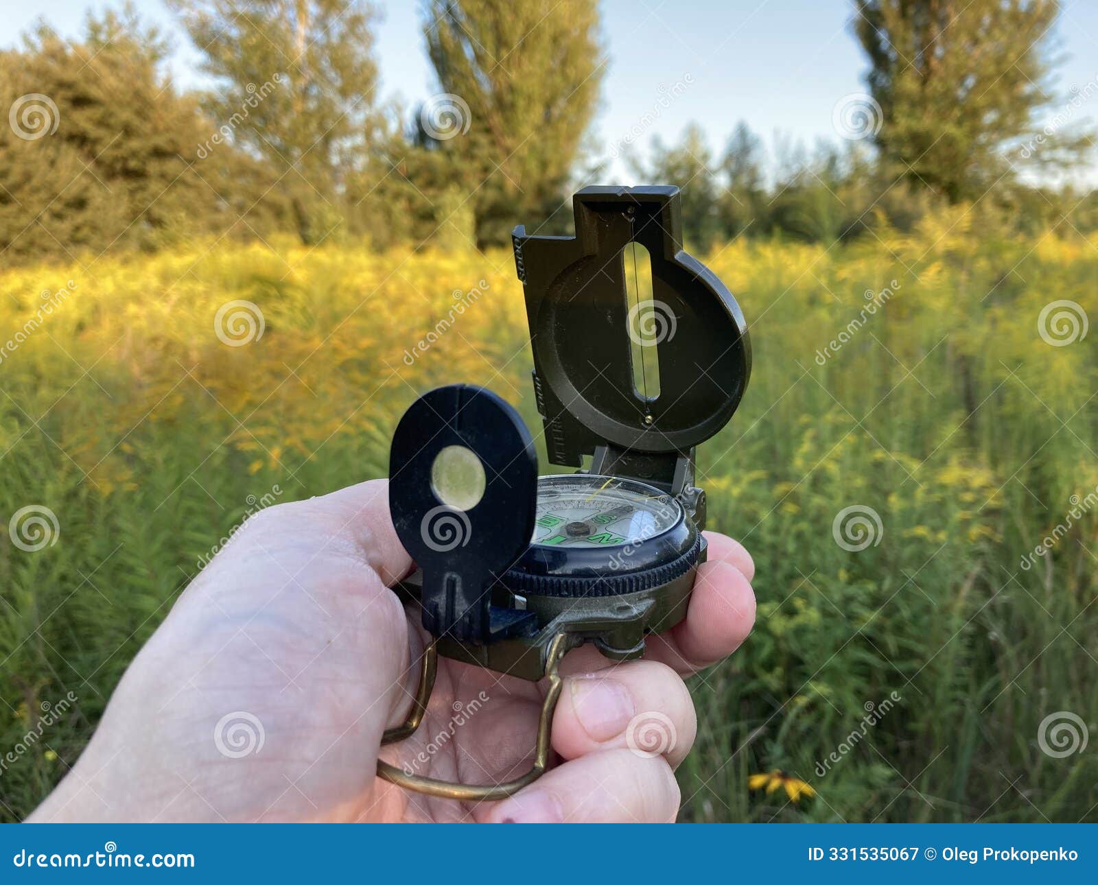 Compass for Orientation on the Terrain during a Hike Stock Image ...