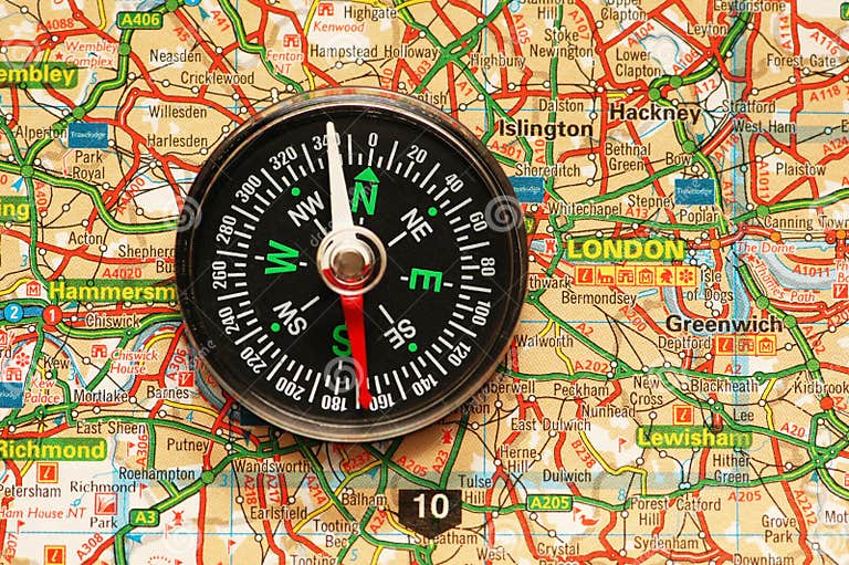 Compass over the map of UK stock photo. Image of leading - 3181402