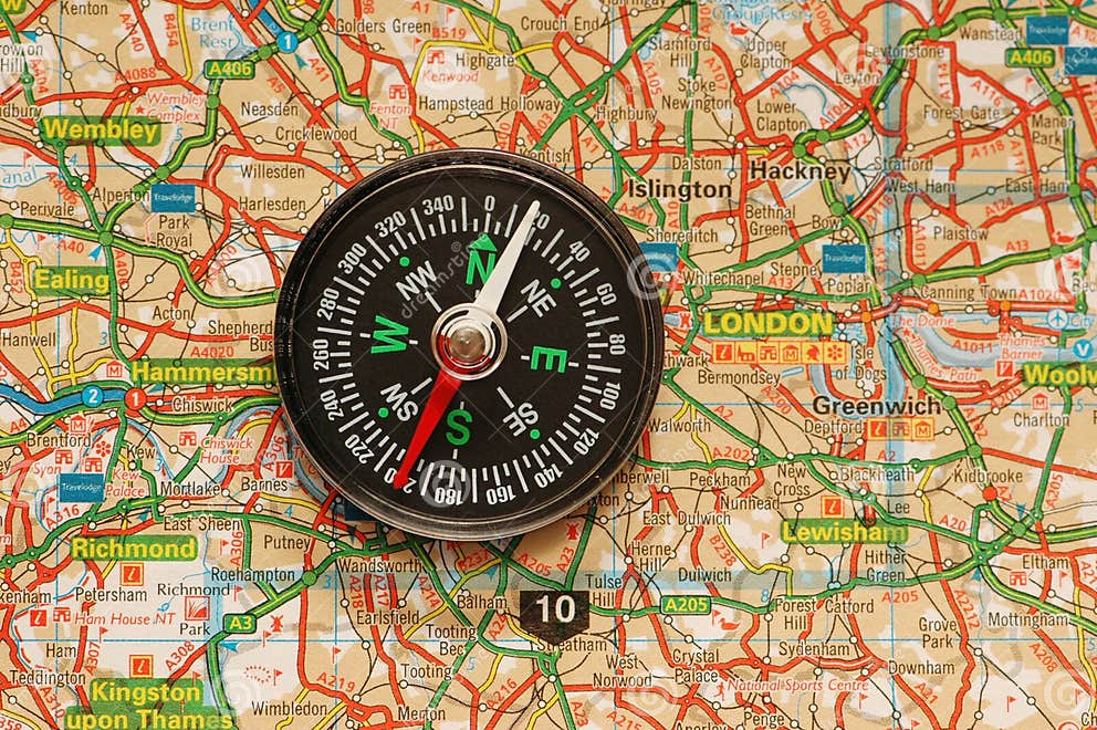 Compass over the map of UK stock image. Image of journey - 8053977
