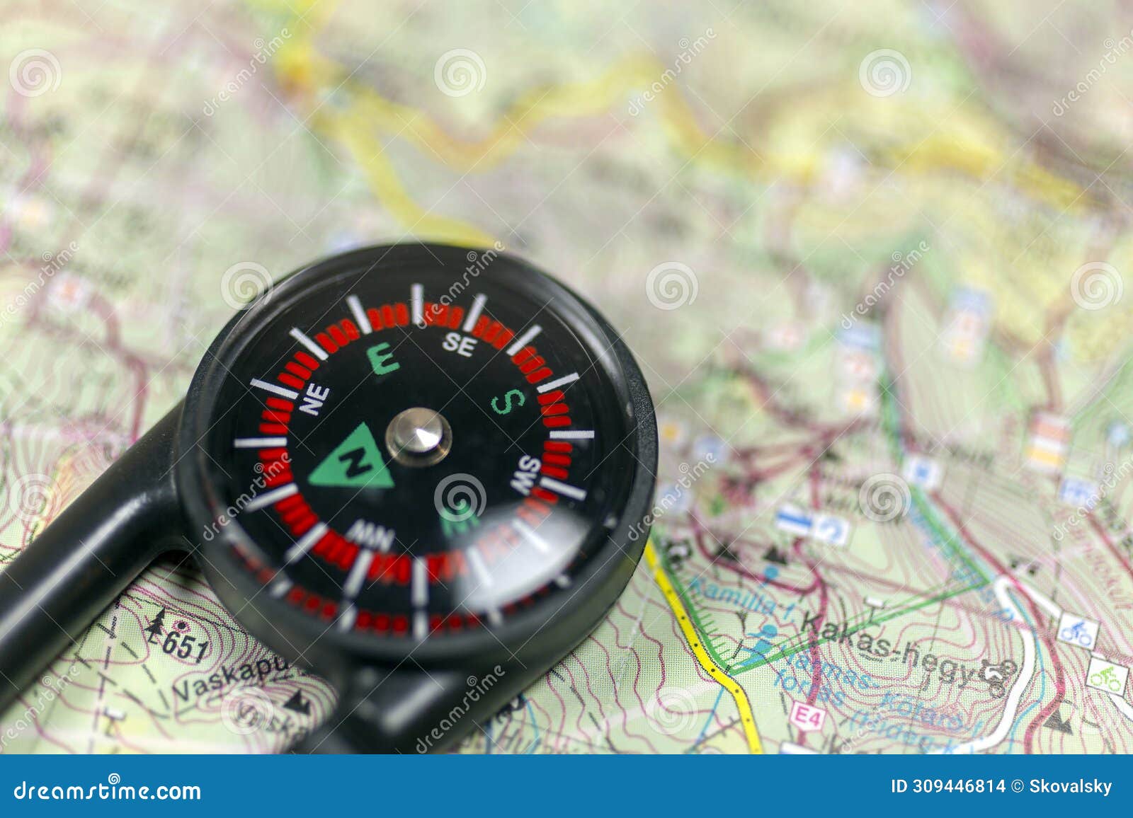 Compass on a paper map stock photo. Image of nautical - 309446814