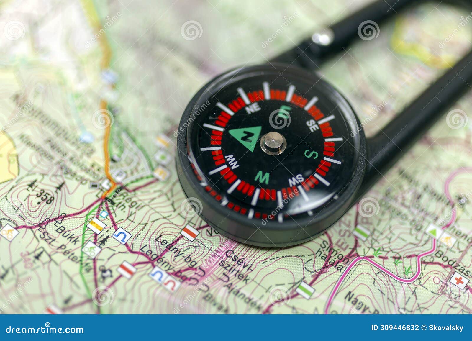 Compass on a paper map stock photo. Image of equipment - 309446832