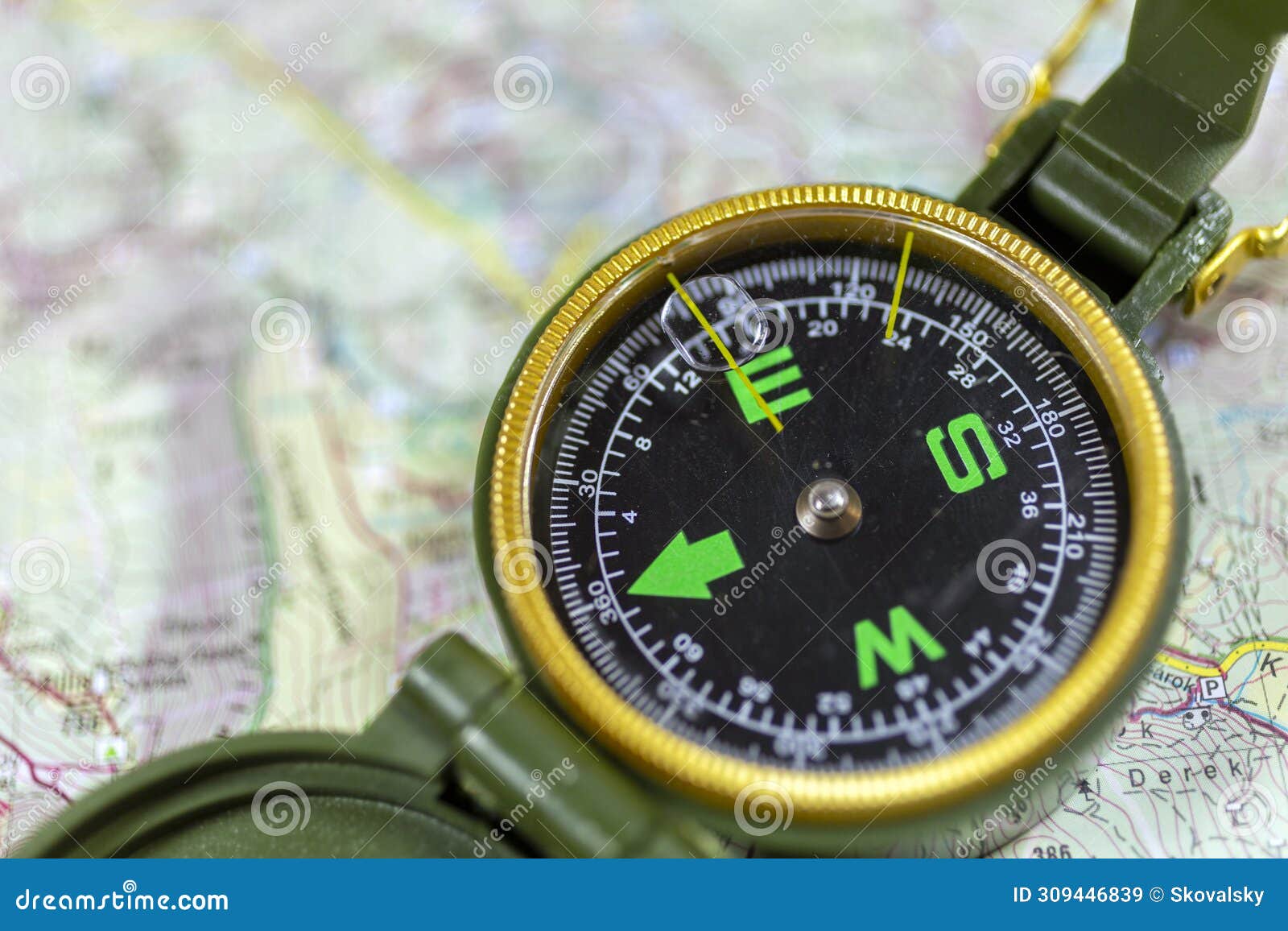 Compass on a paper map stock image. Image of adventure - 309446839