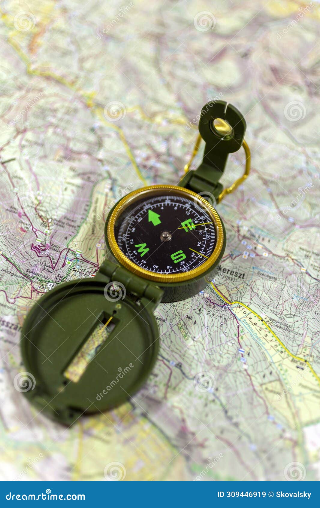 Compass on a paper map stock image. Image of north, longitude - 309446919