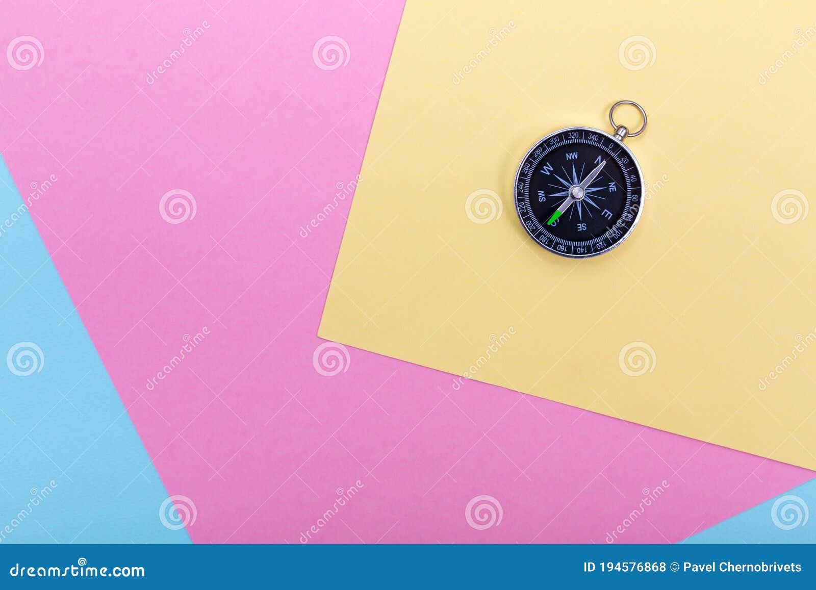 Compass on Pastel Colored Paper Texture Stock Photo - Image of creative ...