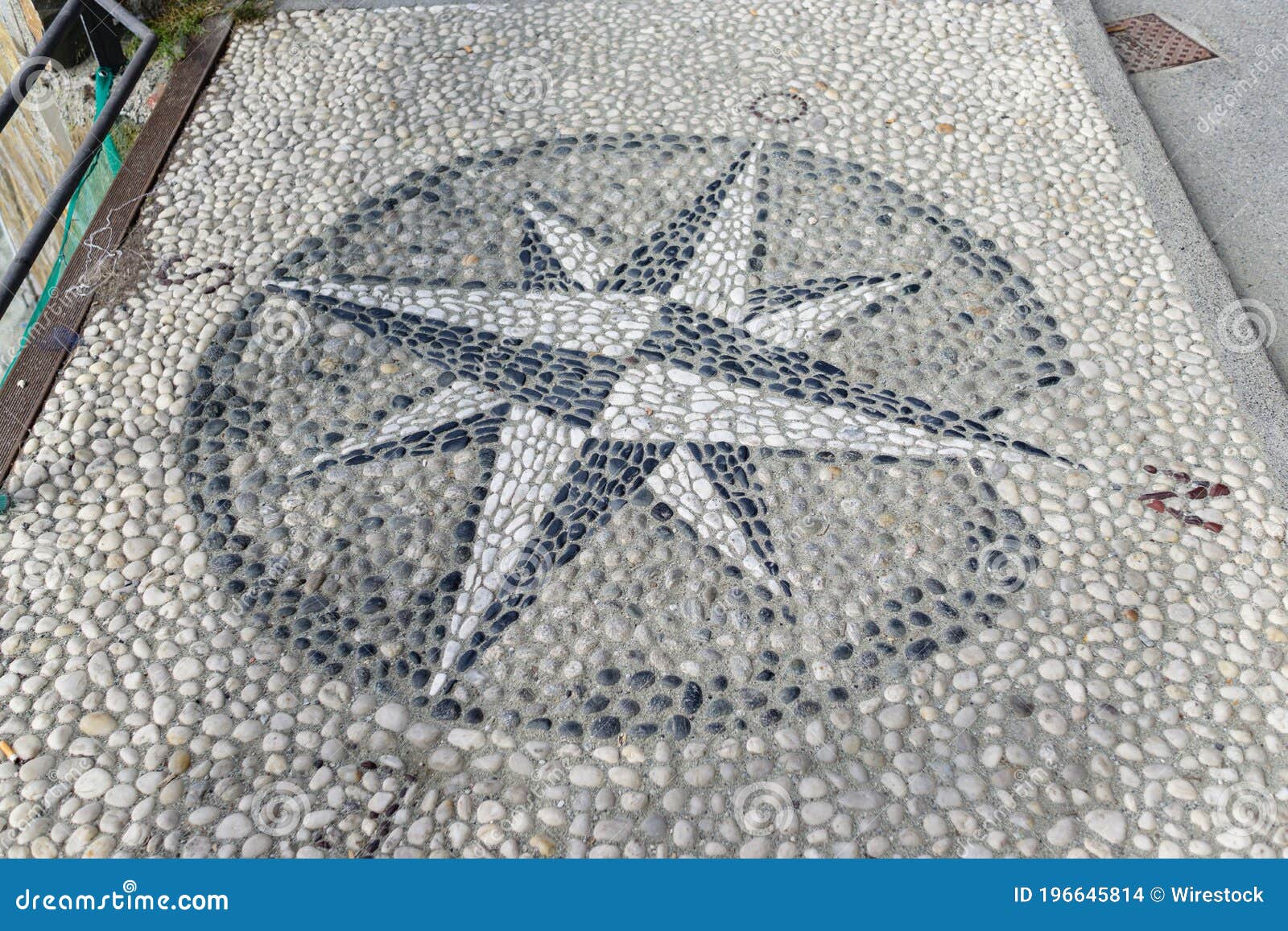 Compass Paved Ground with Pebbles Stock Photo - Image of design, street ...