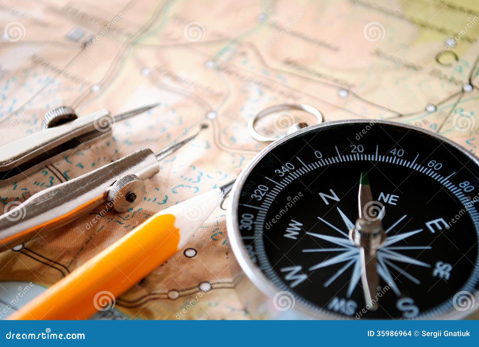 Compass and Pencil on a Map Stock Photo - Image of travel, sightseeing ...