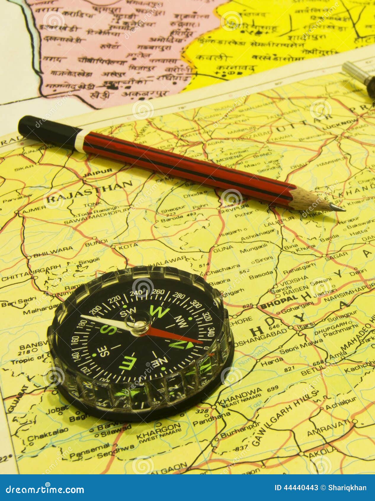 Directional Compass and Pencil Over Map Stock Image - Image of maps ...