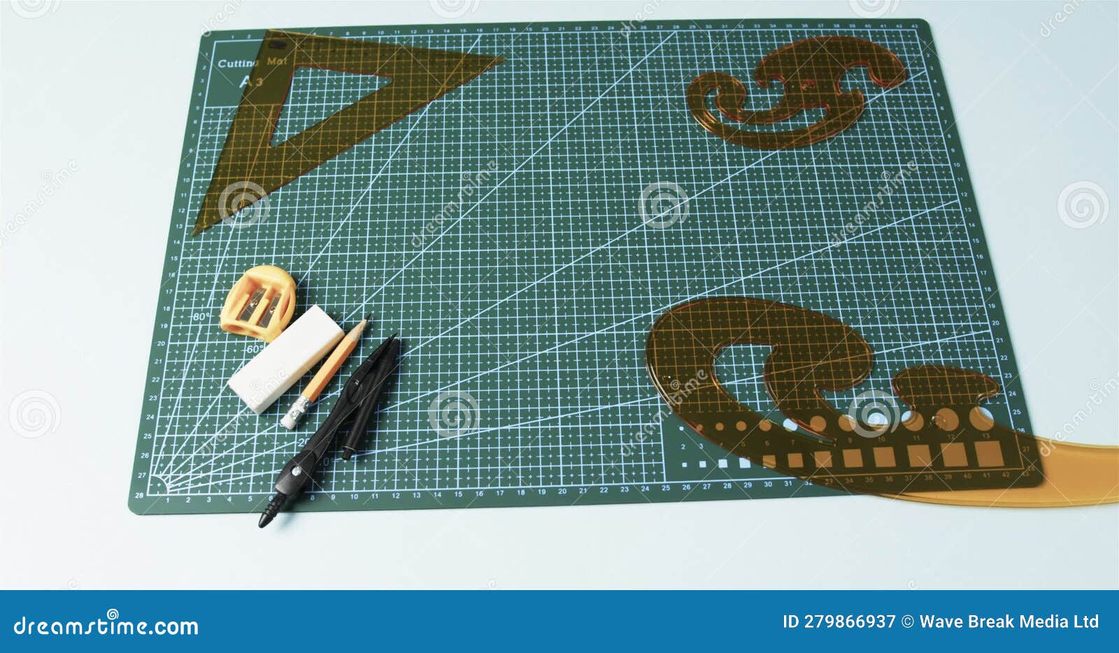 Compass, Pencil, Sharpener, Eraser and Rulers with Pad on White ...