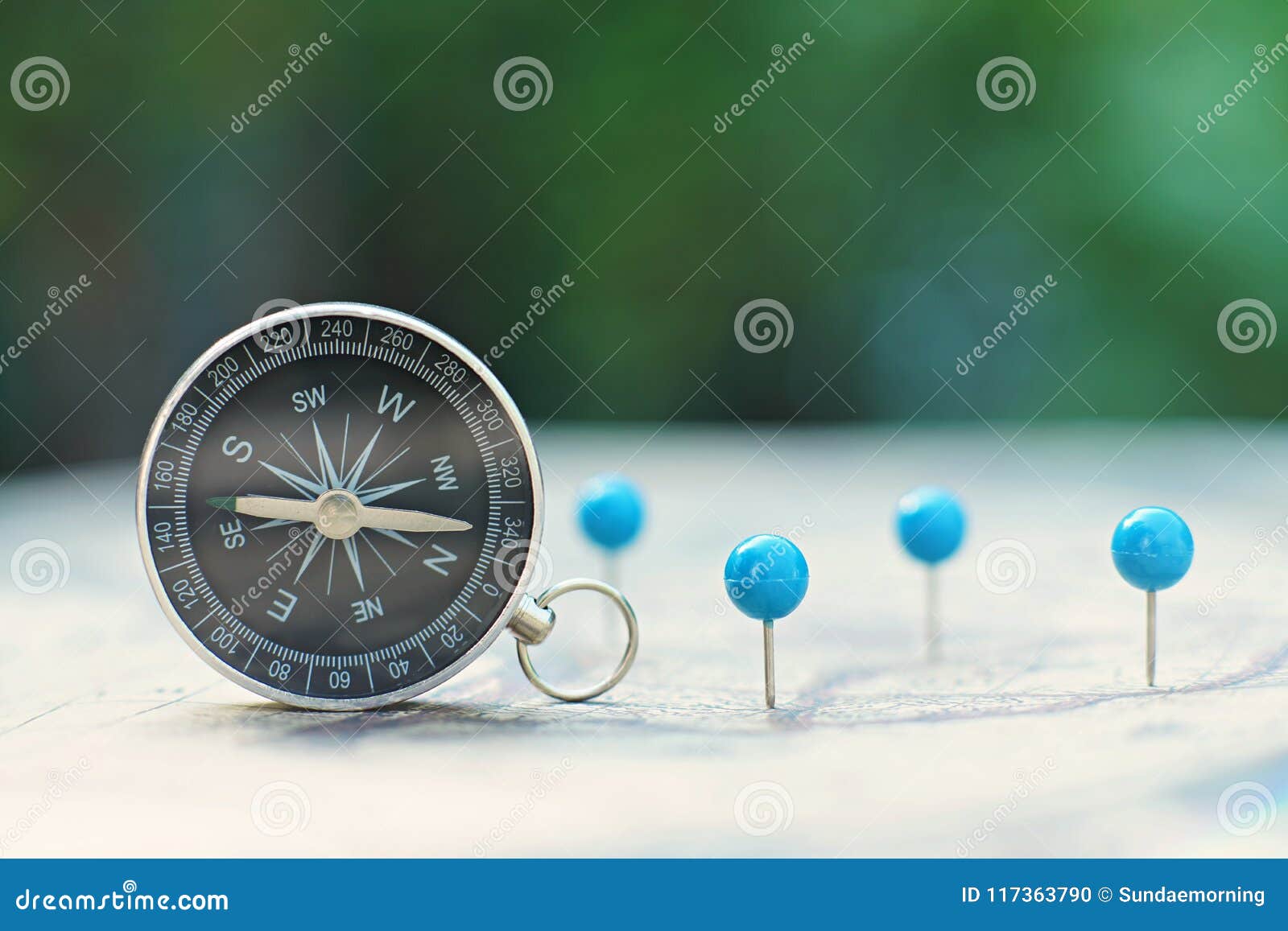 Compass and Pin Point Marking with Vintage Map Background Stock Photo ...