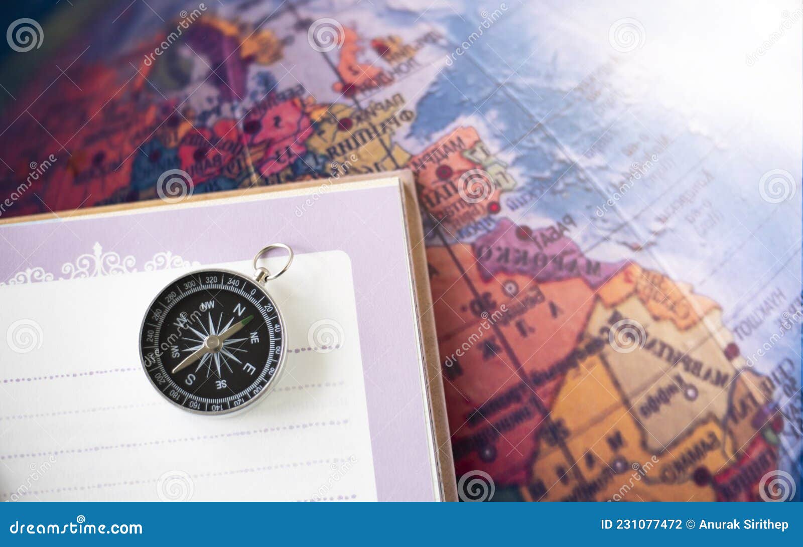 A Compass Placed On A Graph Paper Royalty-Free Stock Photo ...