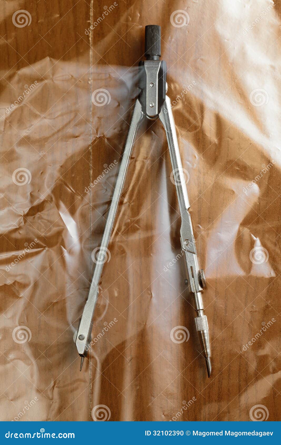 Compass in plastic bag stock photo. Image of divider - 32102390