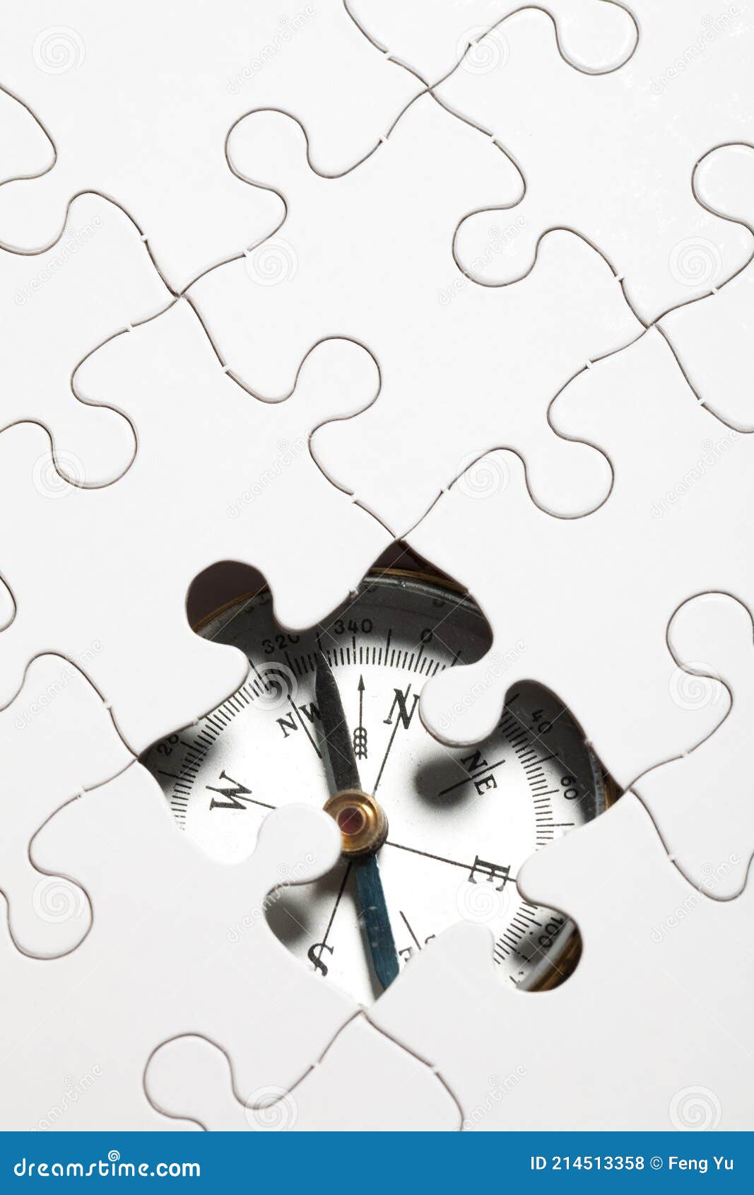 Compass and Puzzle stock photo. Image of puzzle, jigsaw - 214513358