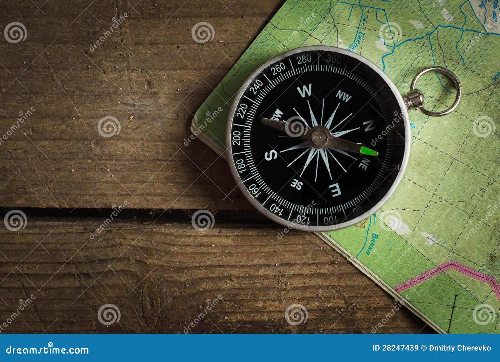 Compass on a road map stock image. Image of road, longitude - 28247439