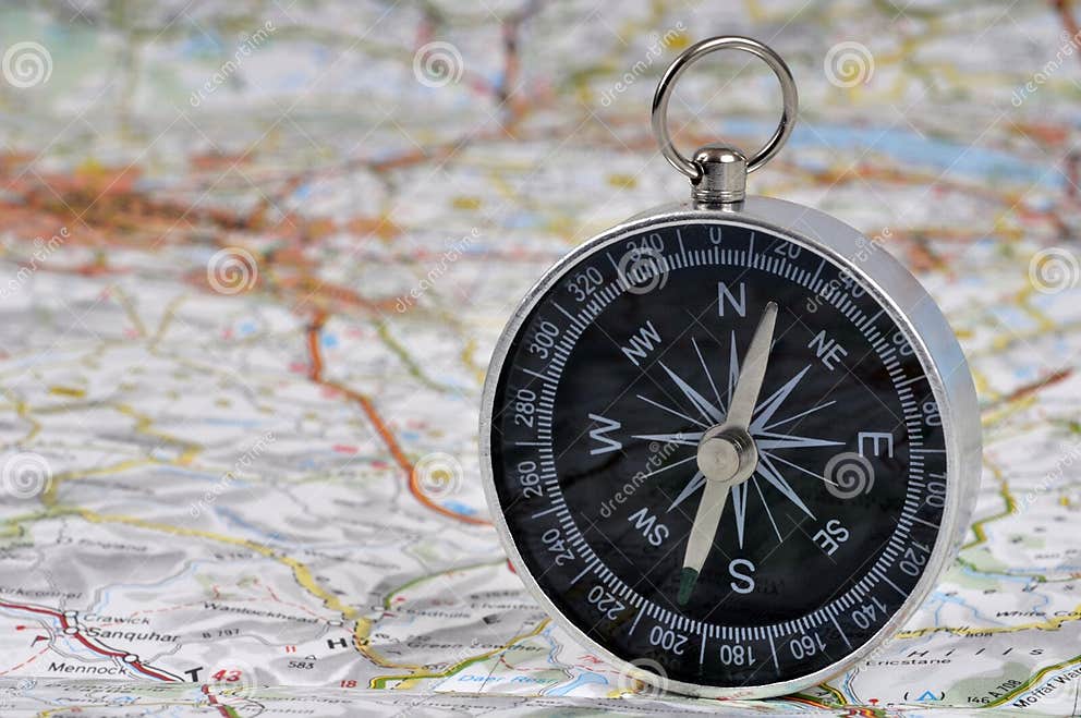 Compass on a road map stock image. Image of south, compass - 136956755