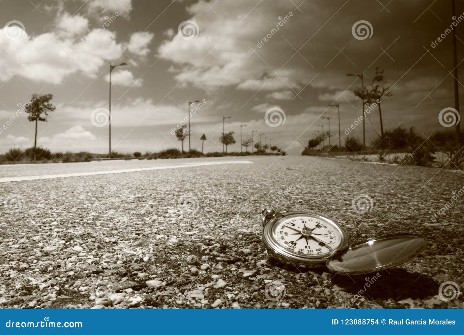 Compass on the road stock photo. Image of white, horizon - 123088754