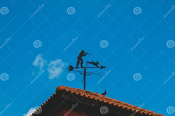Compass on the roof stock image. Image of sign, north - 102707741
