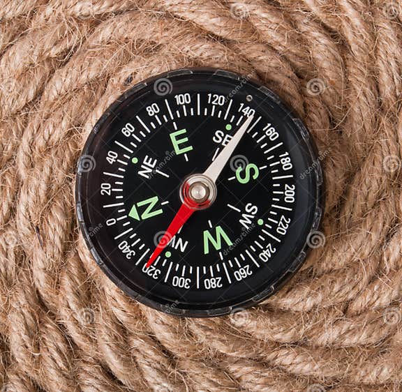 Compass and rope stock image. Image of direction, brown - 27373937