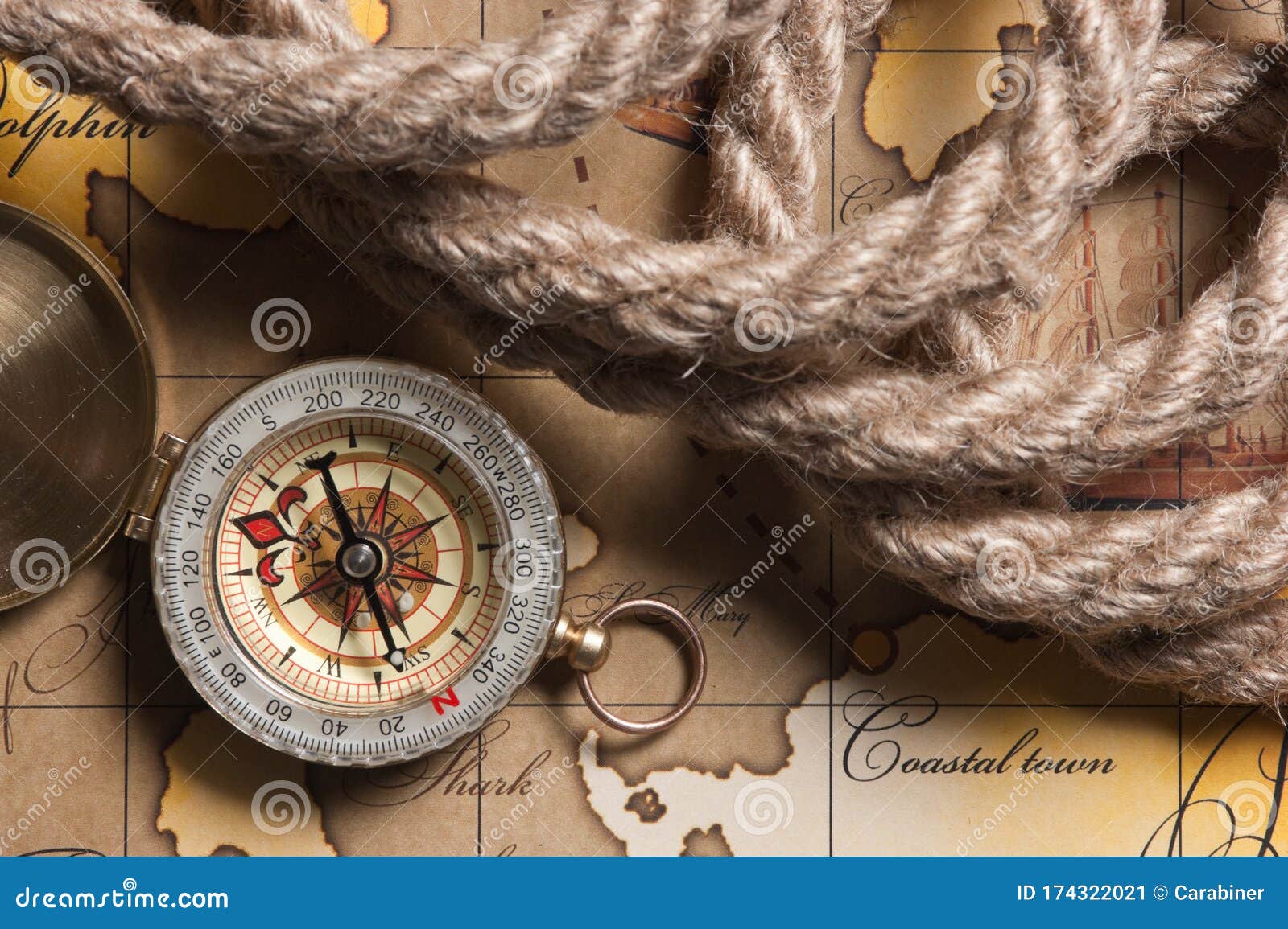 Compass and rope on map stock image. Image of rope, sign - 174322021