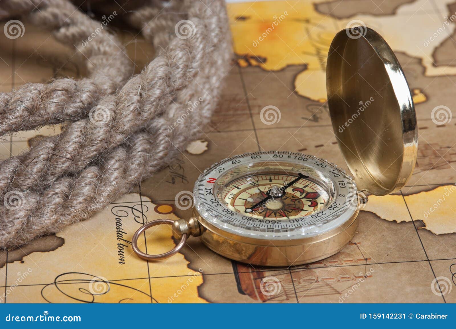 Compass and rope on map stock image. Image of ruler - 159142231