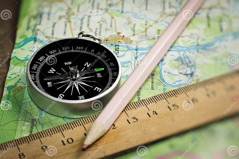 Compass, Ruler and Pencil on a Road Map Stock Photo - Image of paper ...