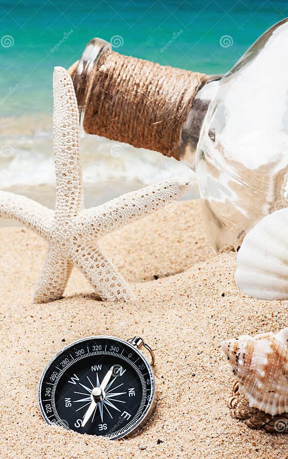 Compass and shells stock image. Image of ashore, desert - 40156125
