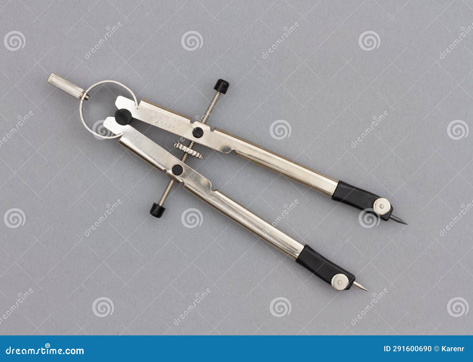 Compass Silver Drawing Tool on Gray Stock Photo - Image of tool, circle ...