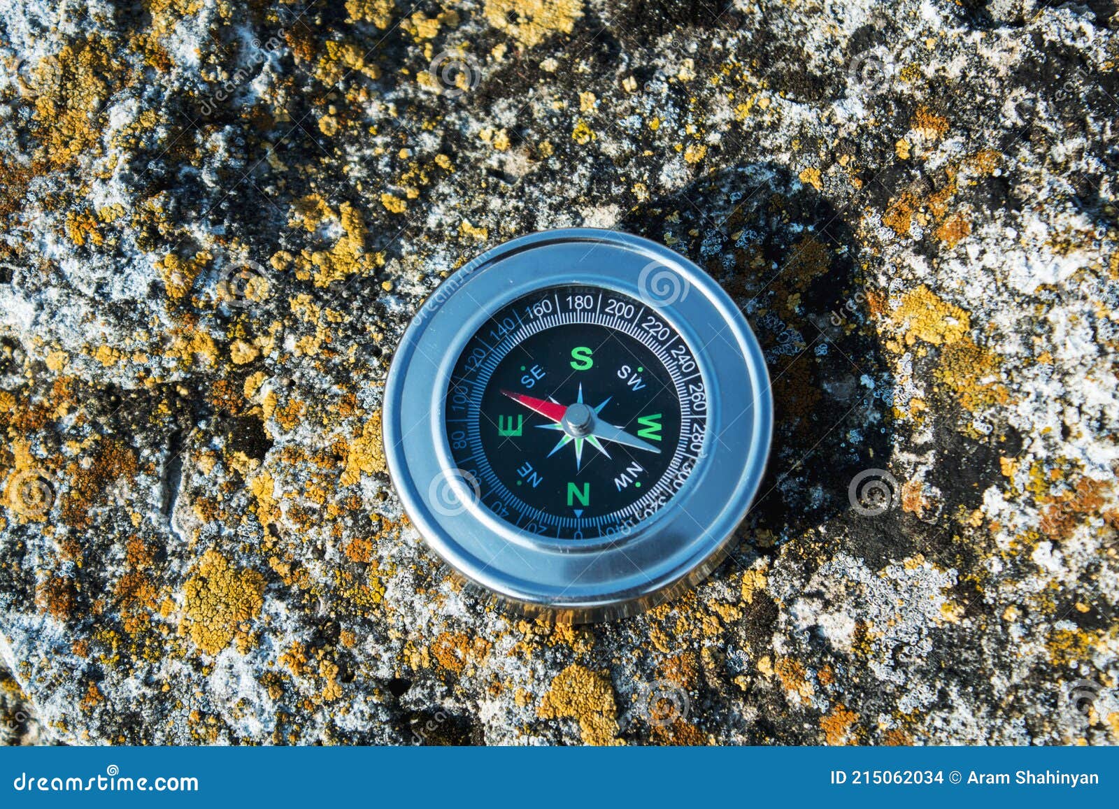 Compass on stone stock photo. Image of geography, closeup - 215062034