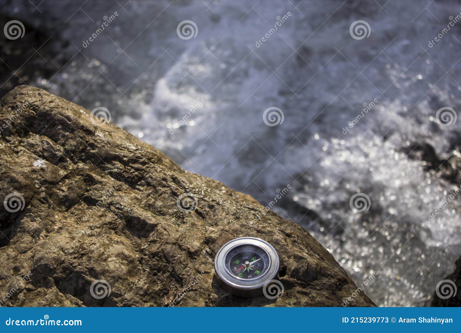 Compass on a Stone Near the River Stock Image - Image of compass, calm ...