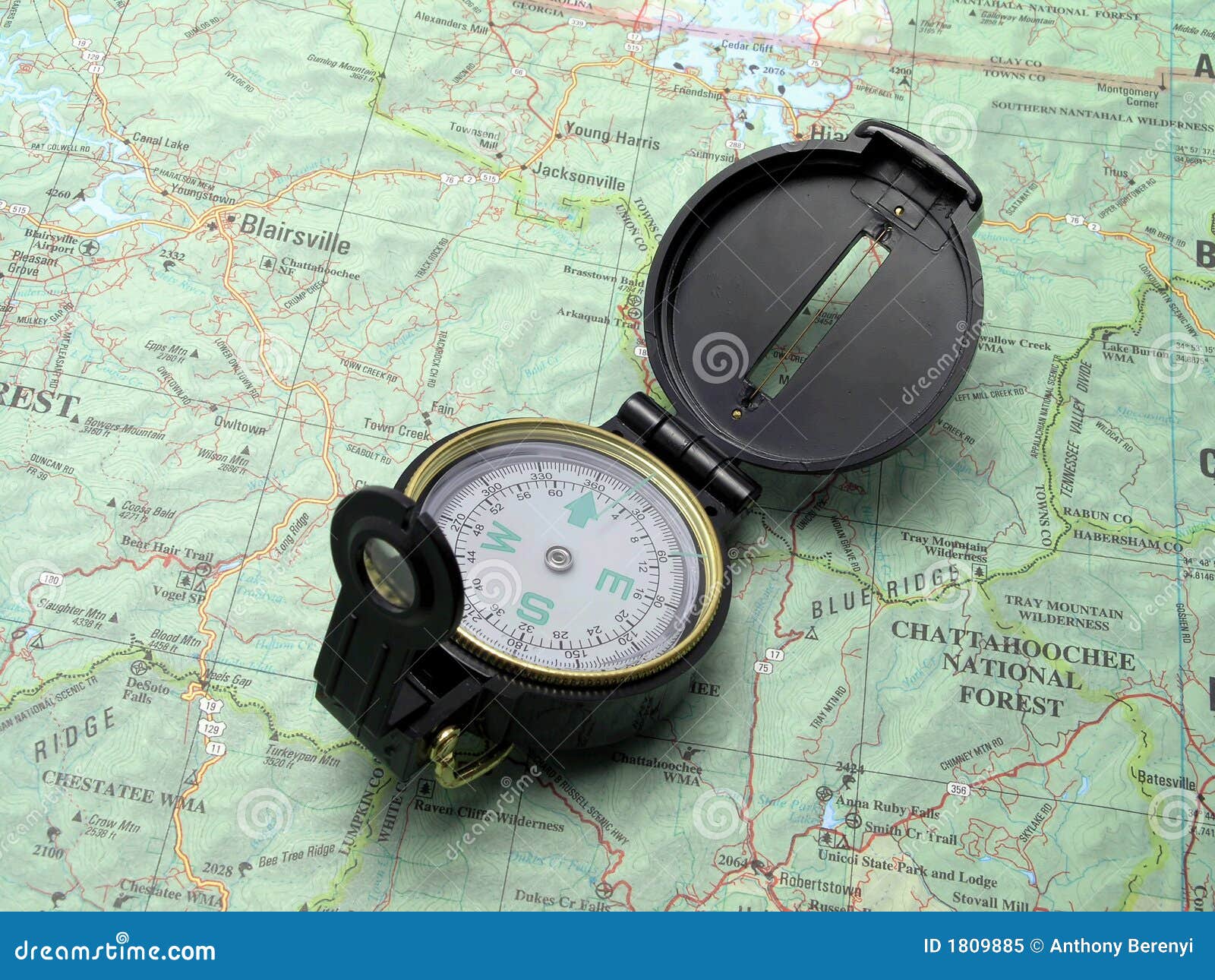 Compass on topo map 2 stock image. Image of compass, brass - 1809885