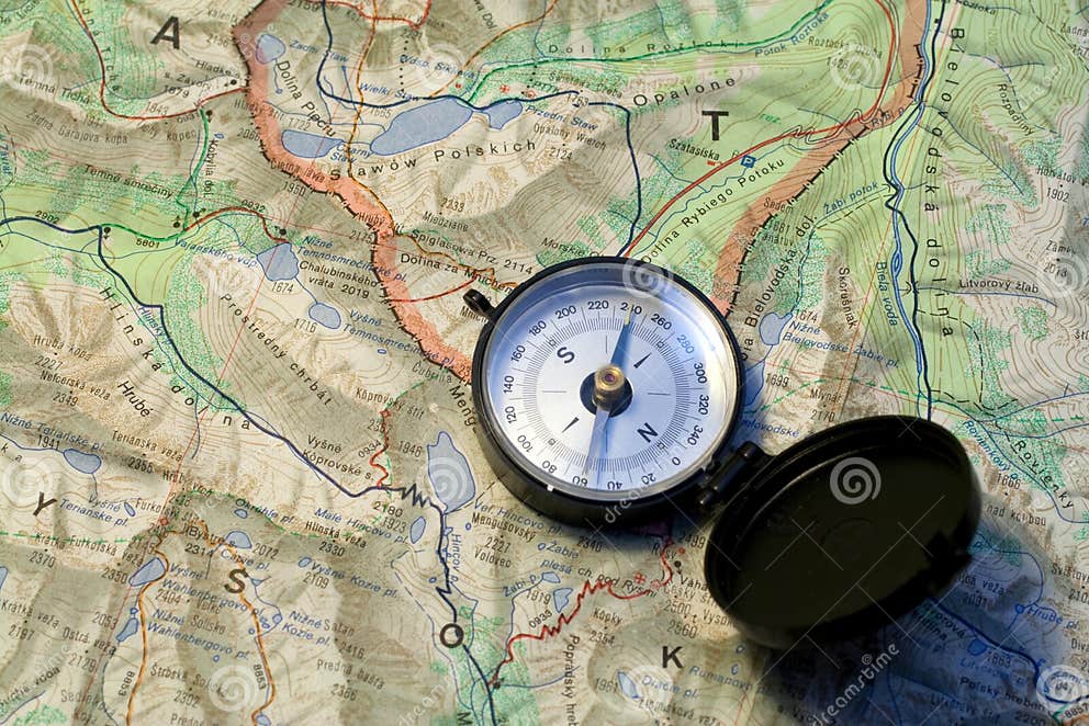 Compass on a Topographic Map Stock Image - Image of exercise, navigate ...