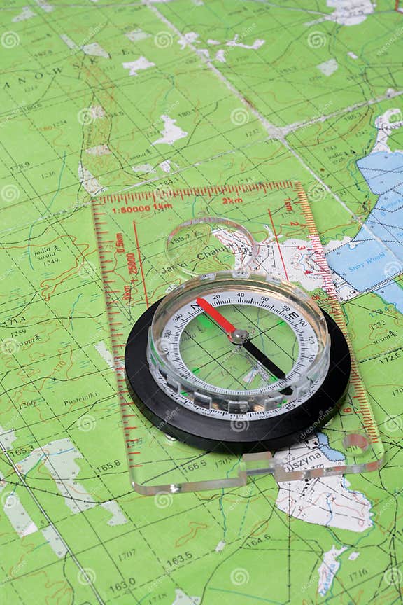 Compass on topographic map stock image. Image of forward - 56013513