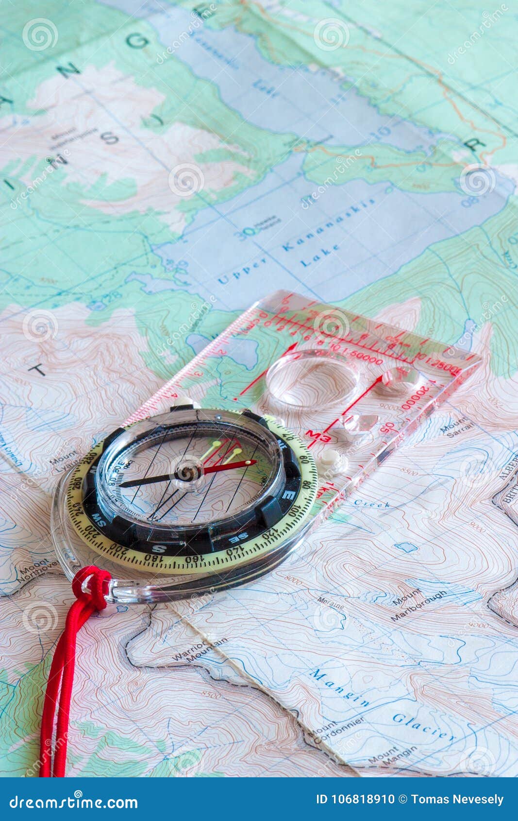 Compass and a Topographic Map Stock Photo - Image of hiking, direction ...