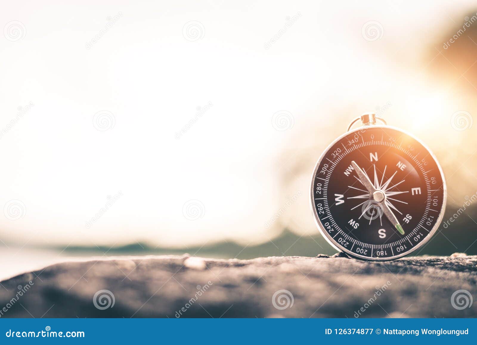 Compass of Tourists on Mountain at Sunset. Stock Image - Image of ...