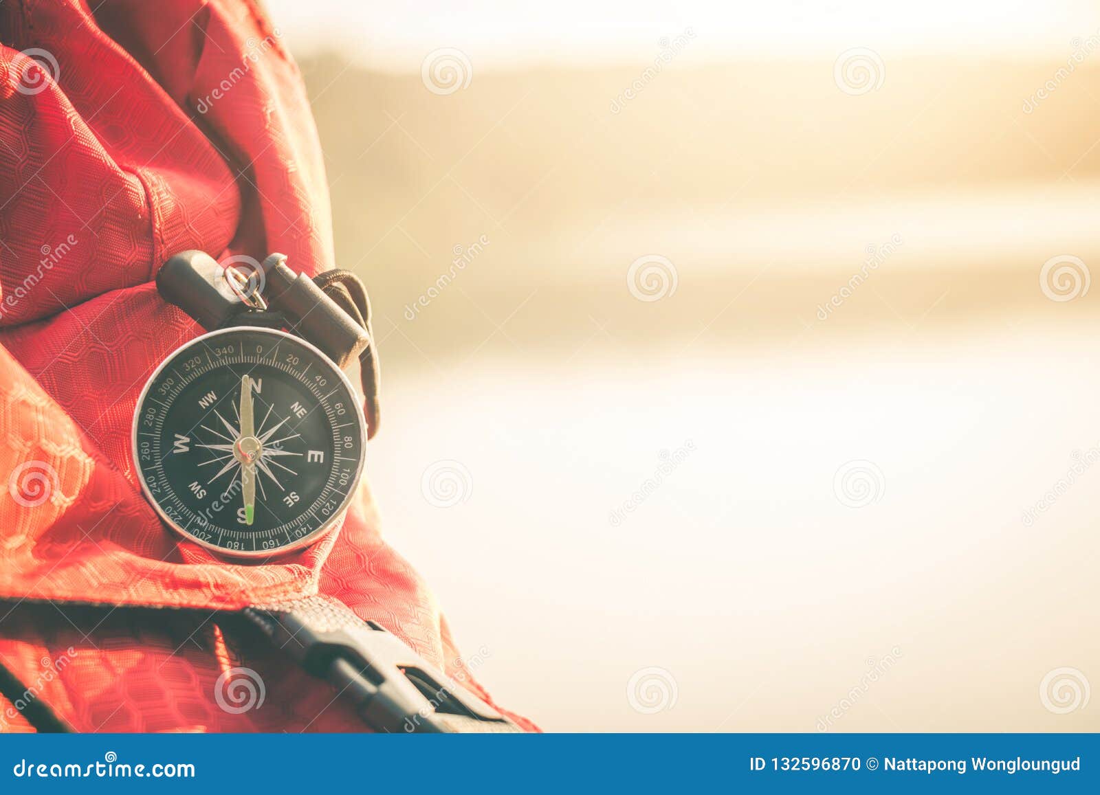 Compass Of Tourists On Mountain At Sunset Sky Royalty-Free Stock Photo ...