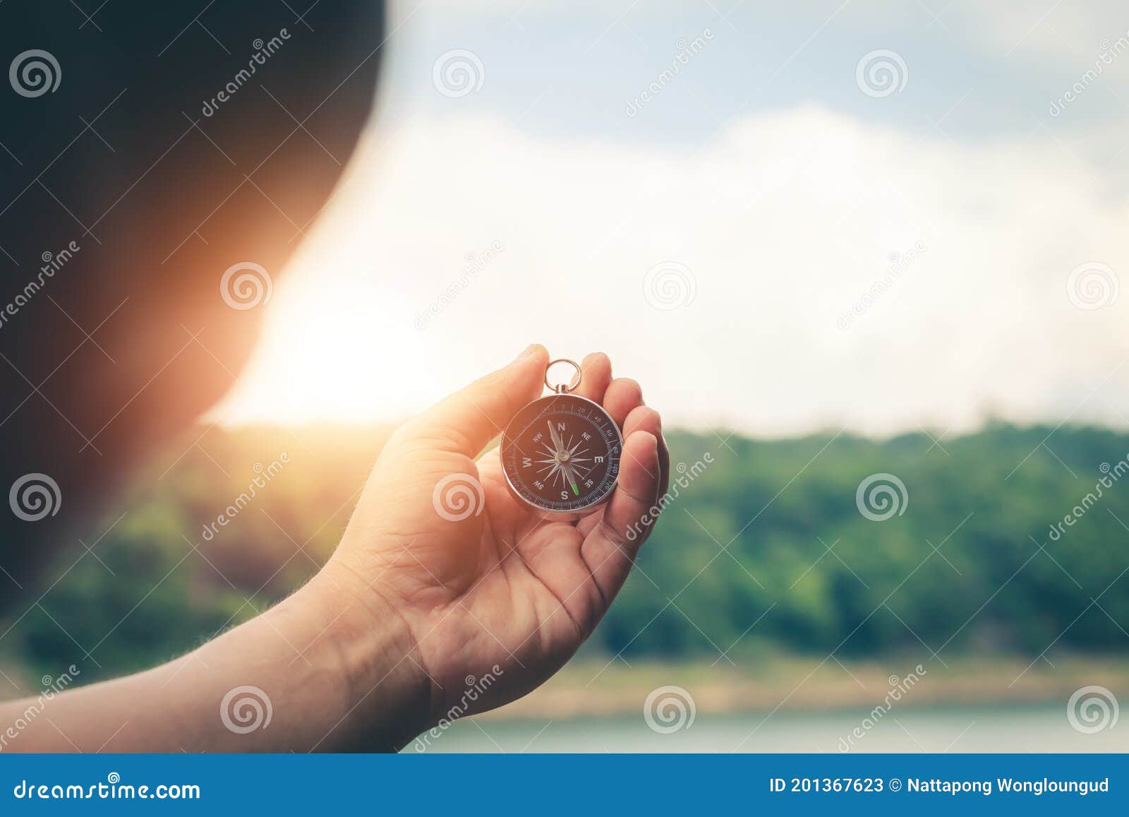 Compass Of Tourists On Mountain At Sunset Sky Royalty-Free Stock Photo ...