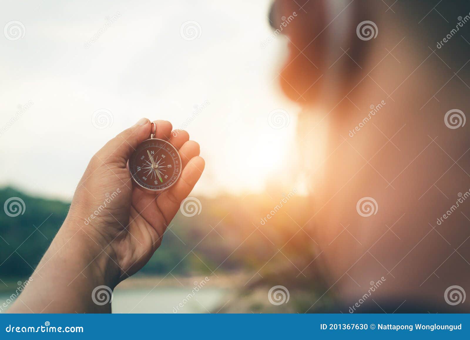 Compass Of Tourists On Mountain At Sunset Sky Royalty-Free Stock Photo ...