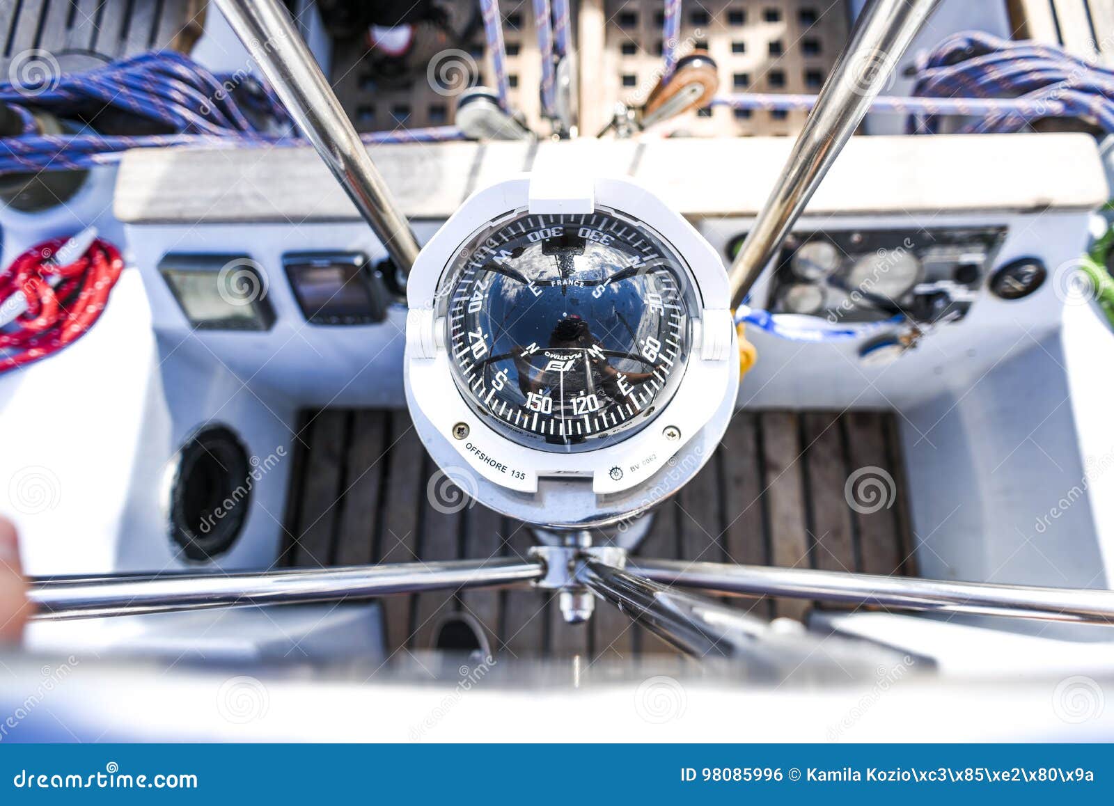A Compass, a View from Above the Steering Wheel on a Yacht. Stock Photo ...