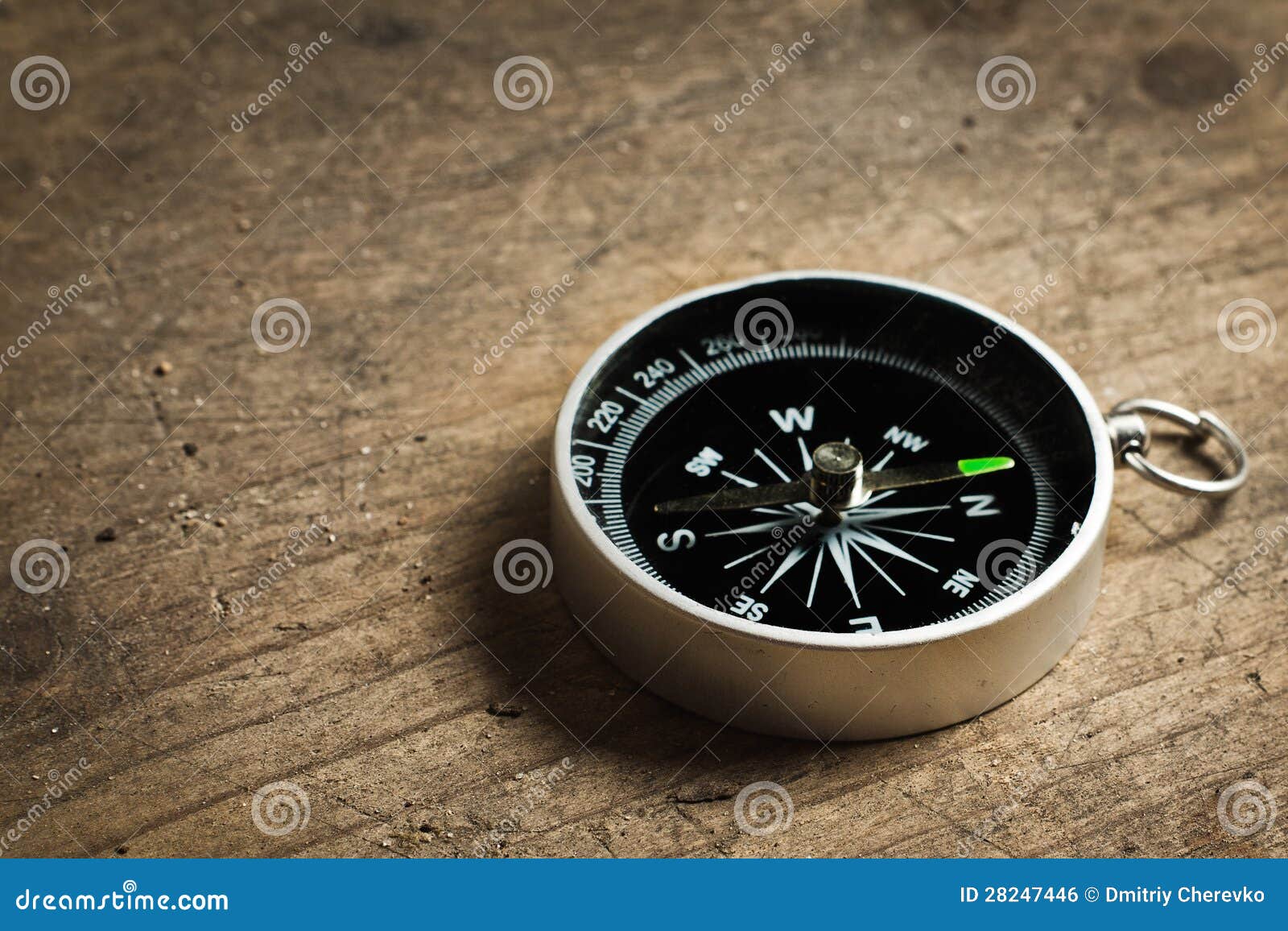 Compass on a wood table stock photo. Image of topography - 28247446