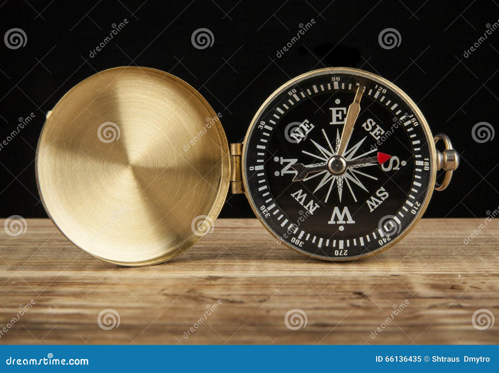 Compass on wooden table stock image. Image of brown, discovery - 66136435