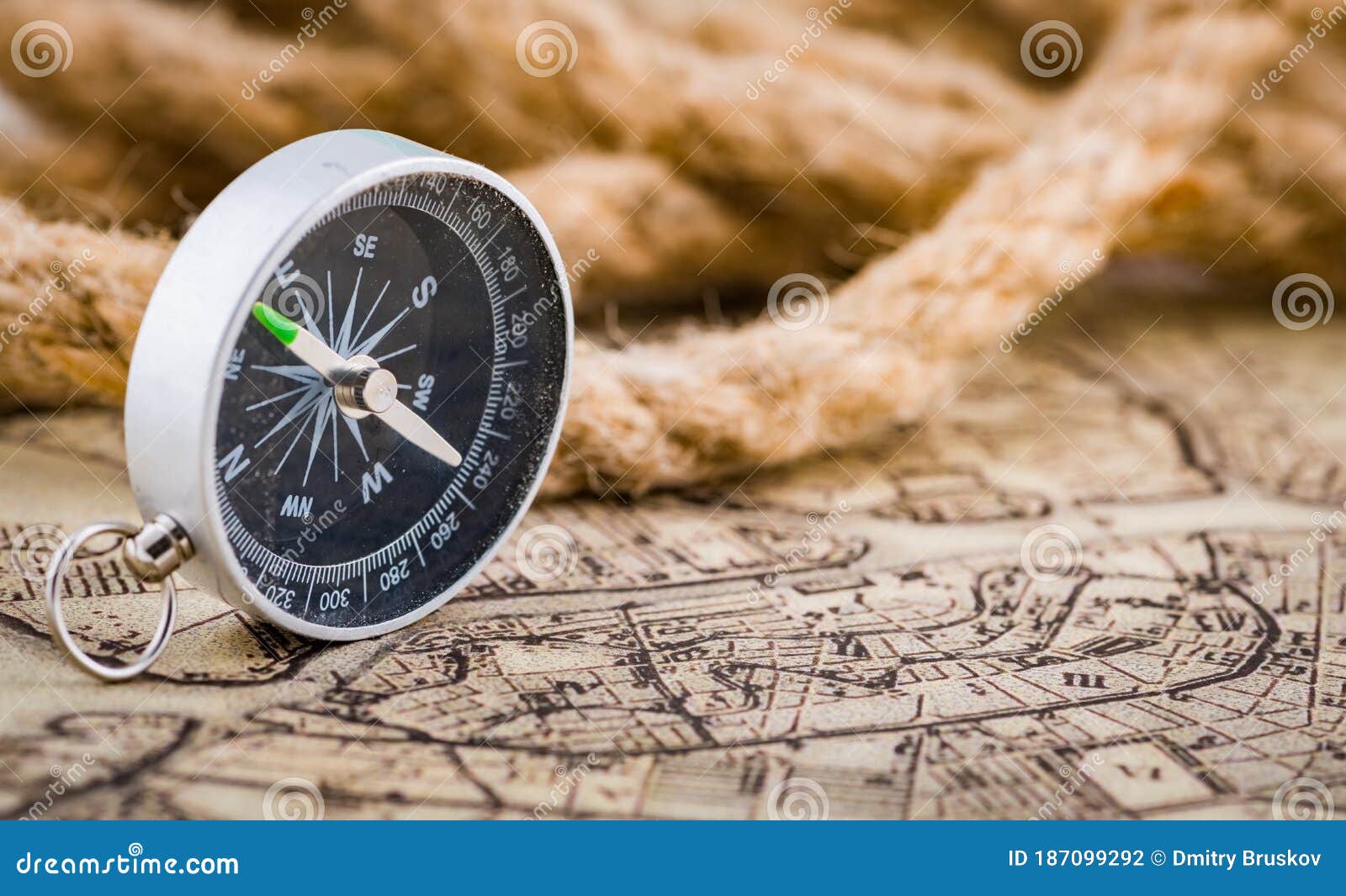 Compass on the world map stock photo. Image of earth - 187099292