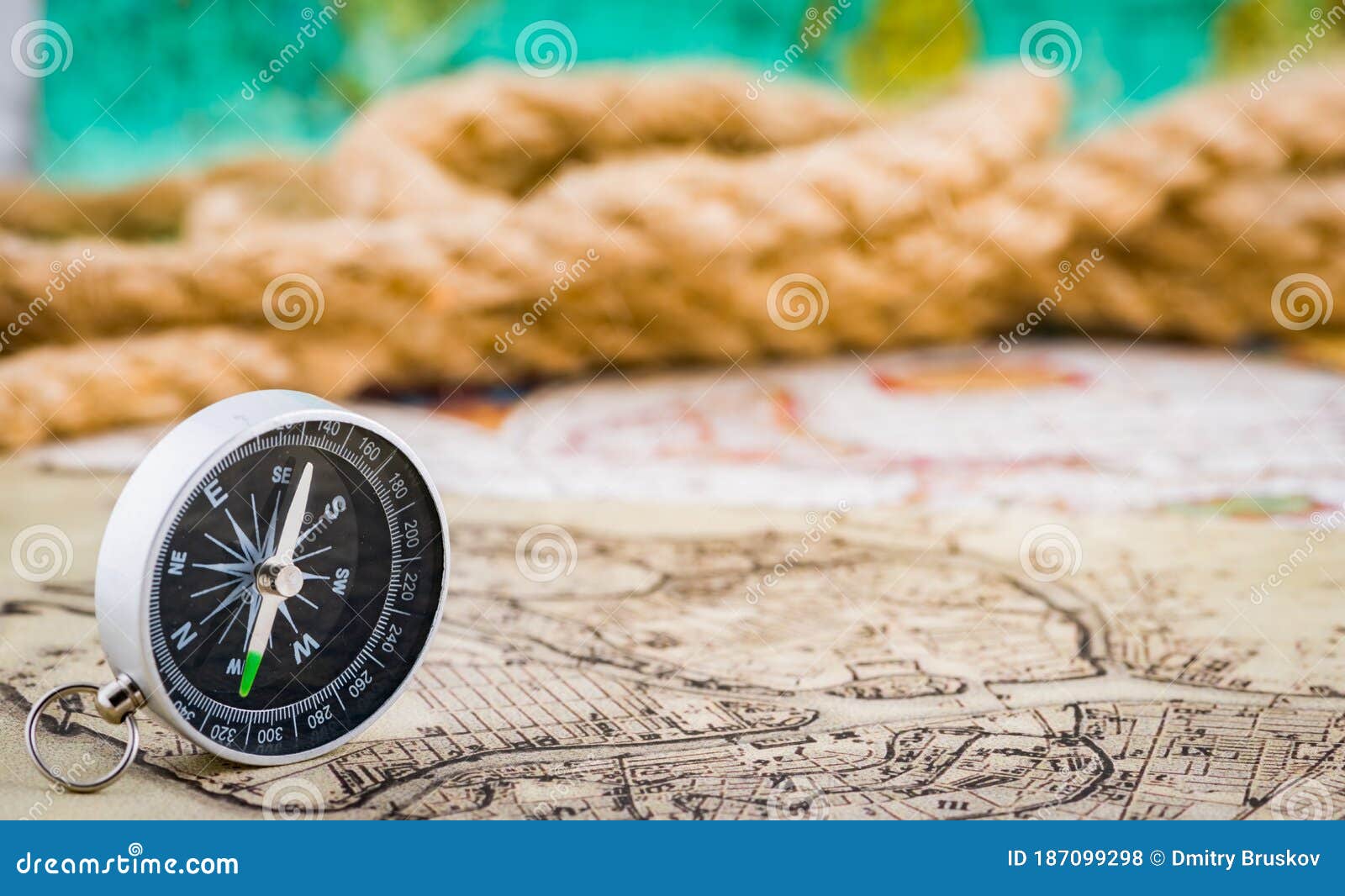 Compass on the world map stock photo. Image of needle - 187099298