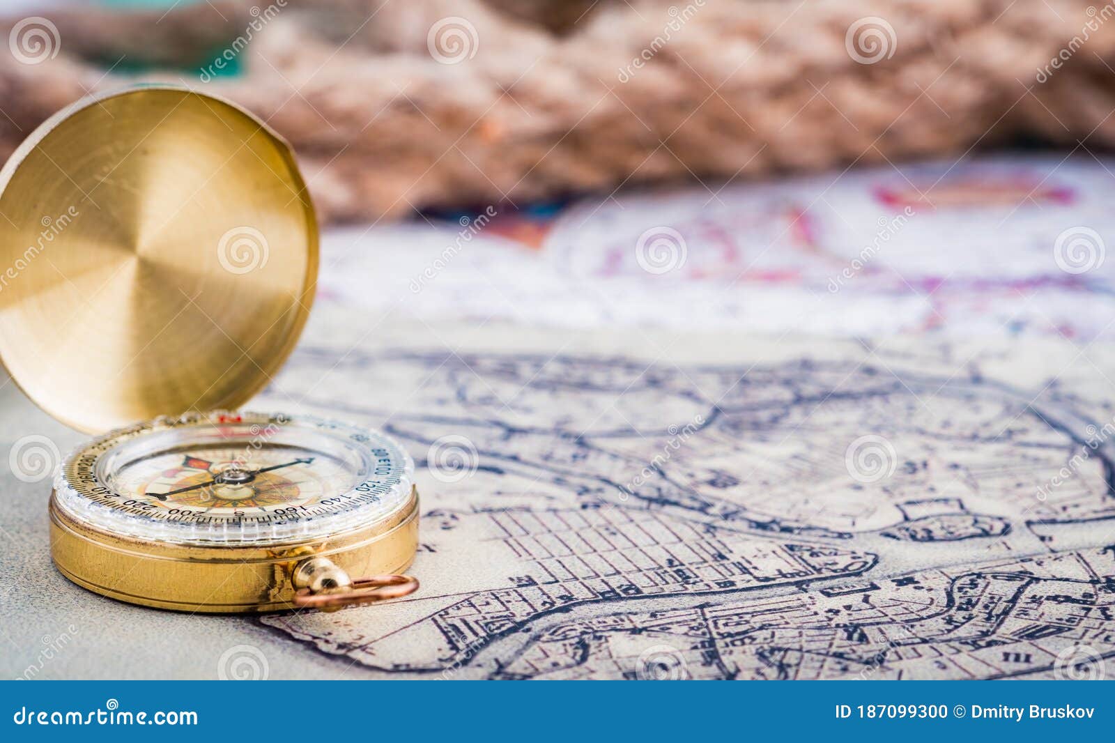 Compass on the world map stock photo. Image of discovery - 187099300