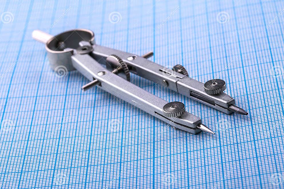 Compasses Over Blue Graph Paper. Stock Photo - Image of grid, cross ...