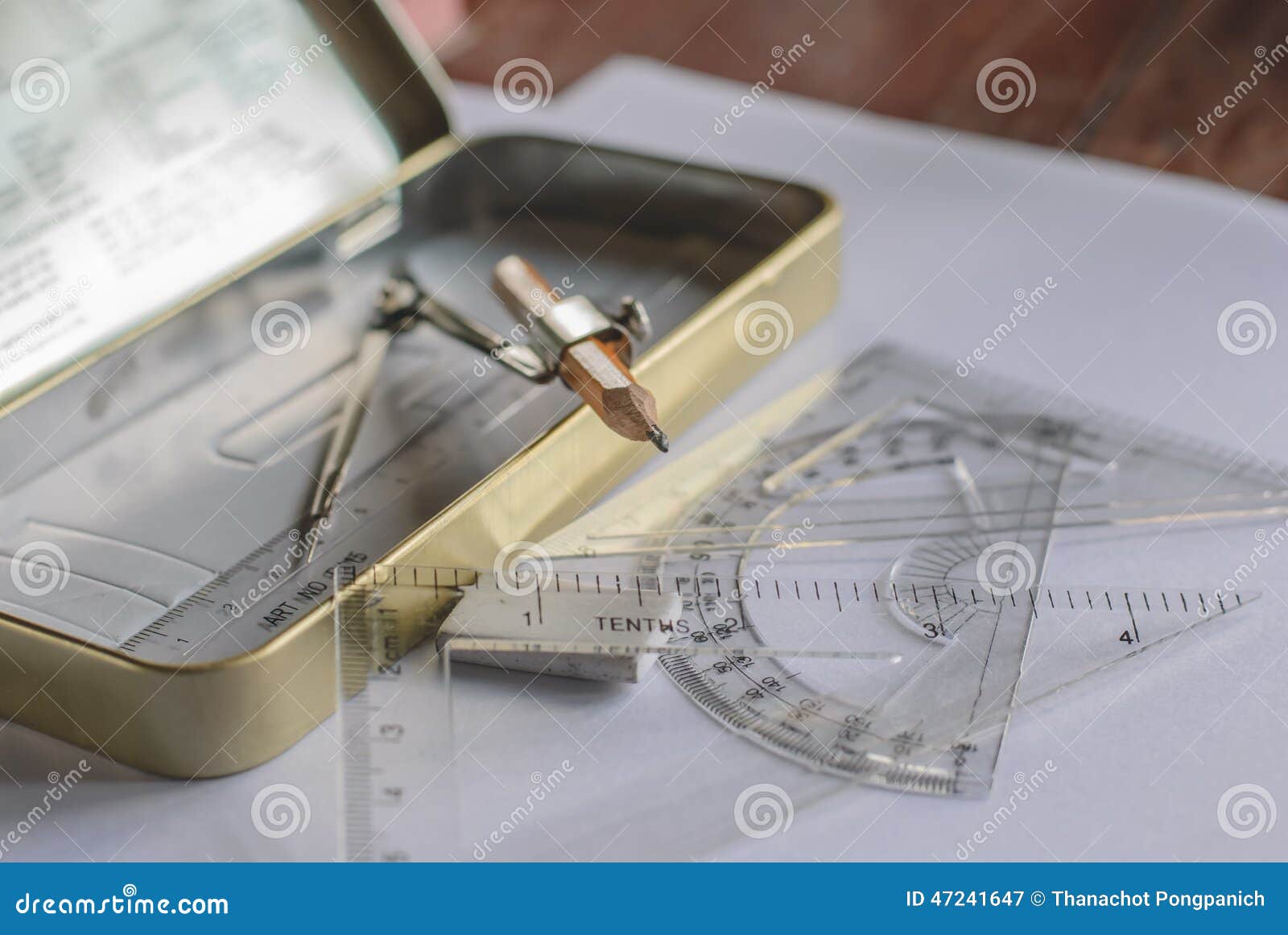 Compasses, Pencil and Rulers on Squared Paper Stock Image - Image of ...