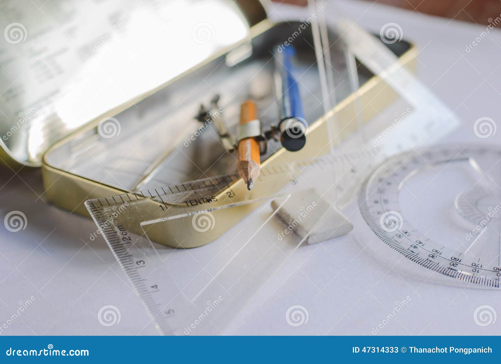 Compasses, Pencil and Rulers on Squared Paper Stock Image - Image of ...