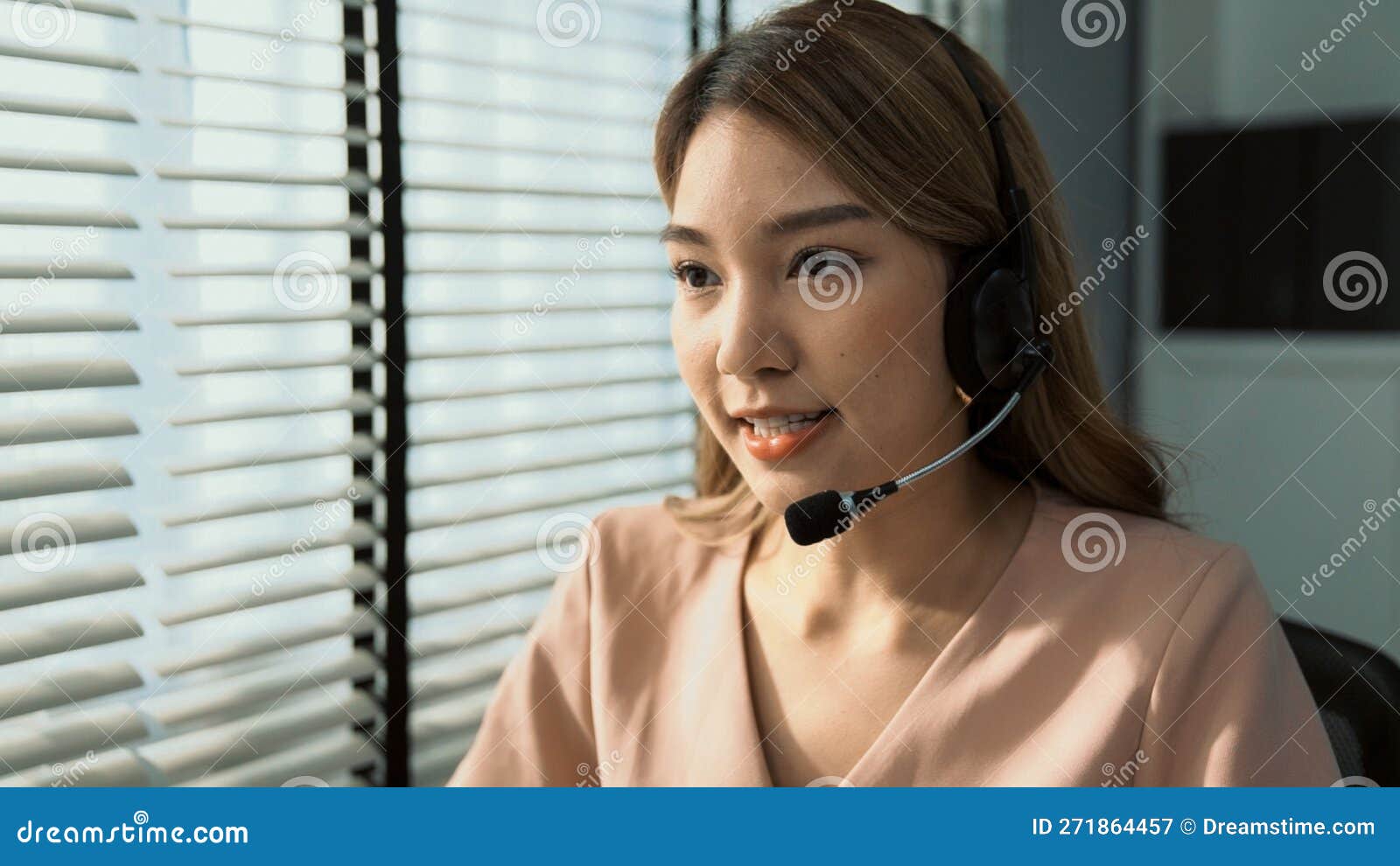 Competent Female Operator Working on Computer and while Talking with ...