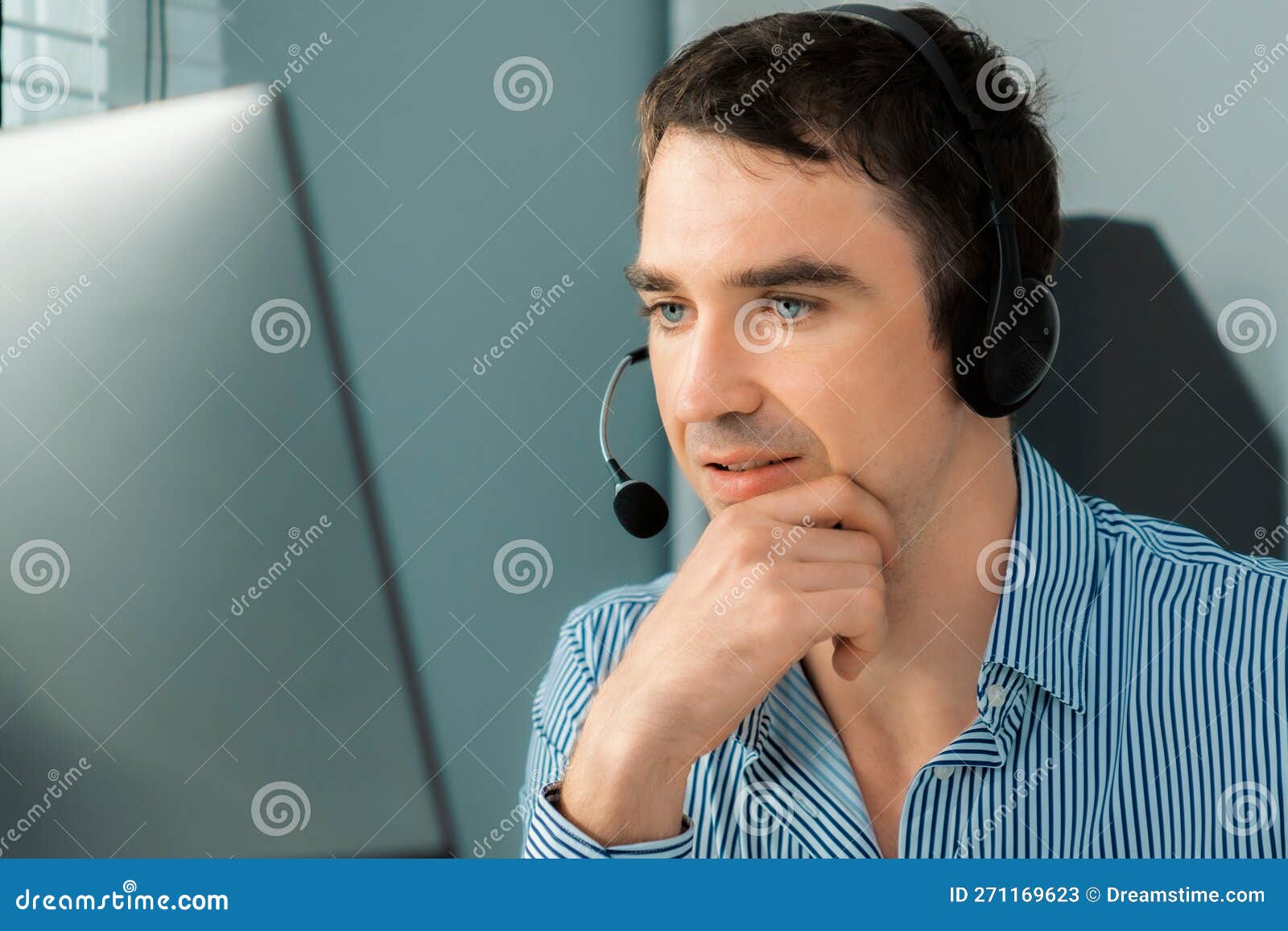 Competent Male Operator Working with Customers in the Office. Stock ...