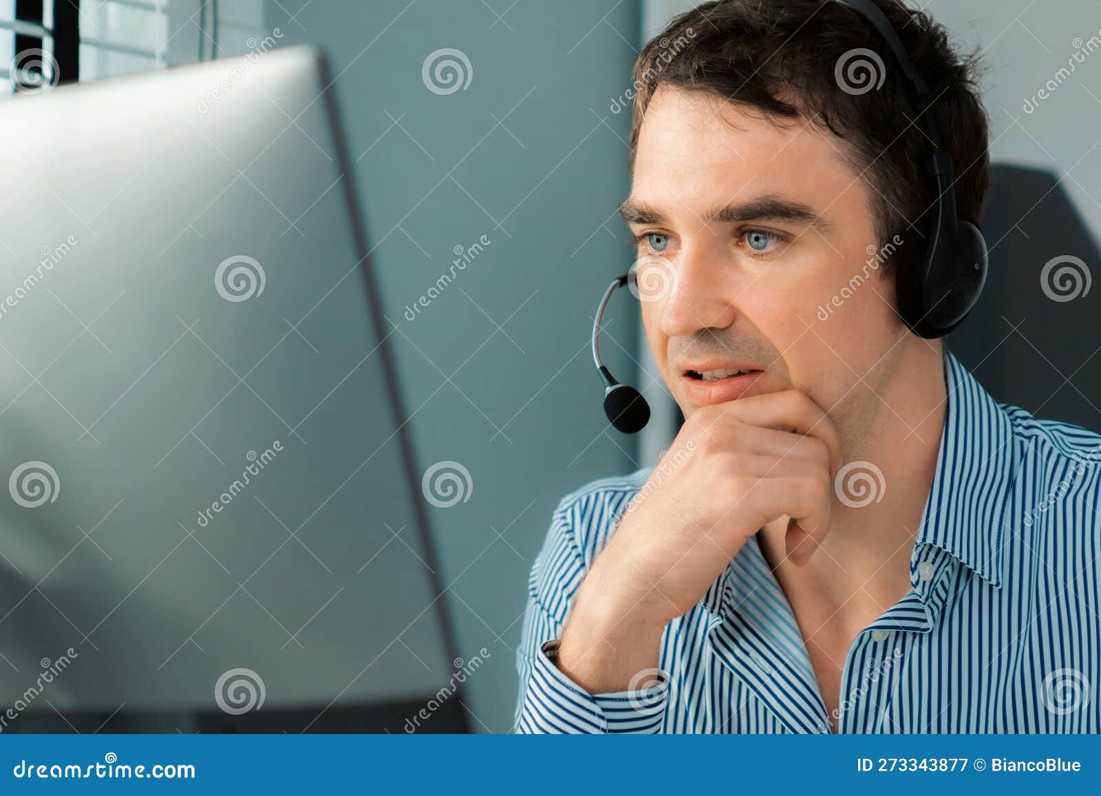 Competent Male Operator Working with Customers in the Office. Stock ...