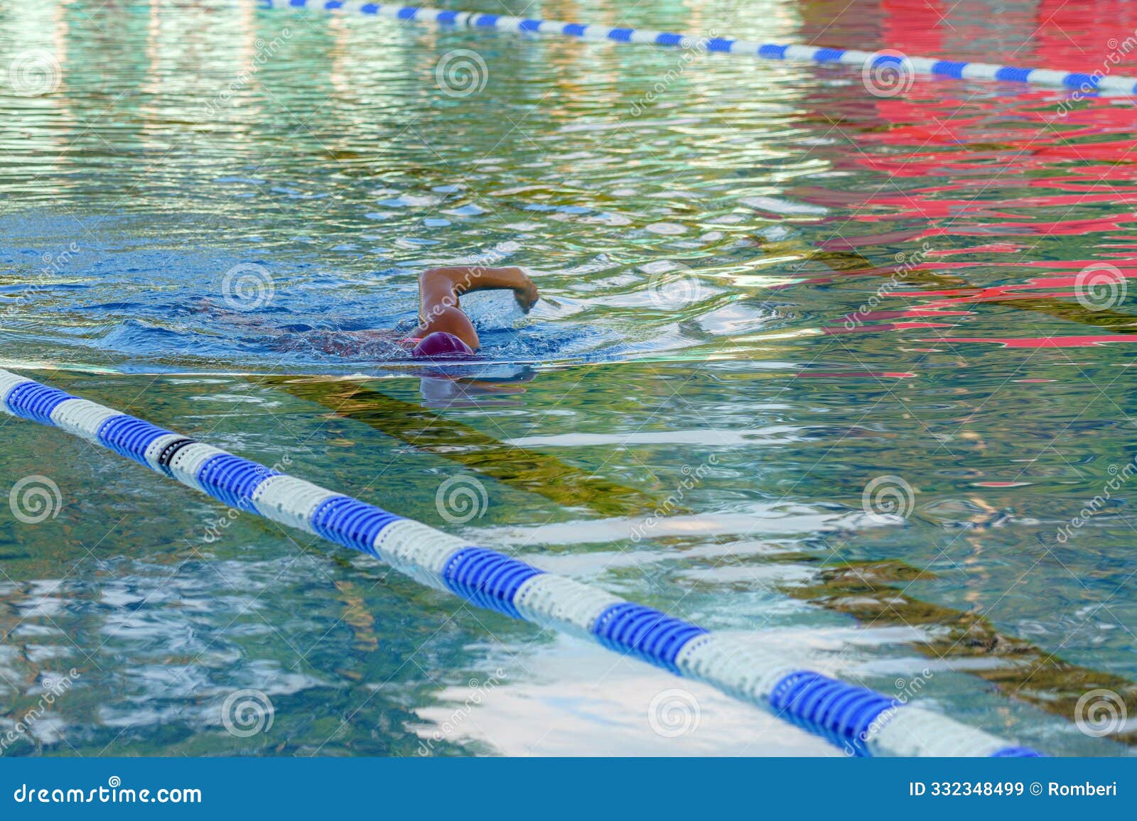 A Competitive Swimmer Swims in a Pool during Training Stock Image ...