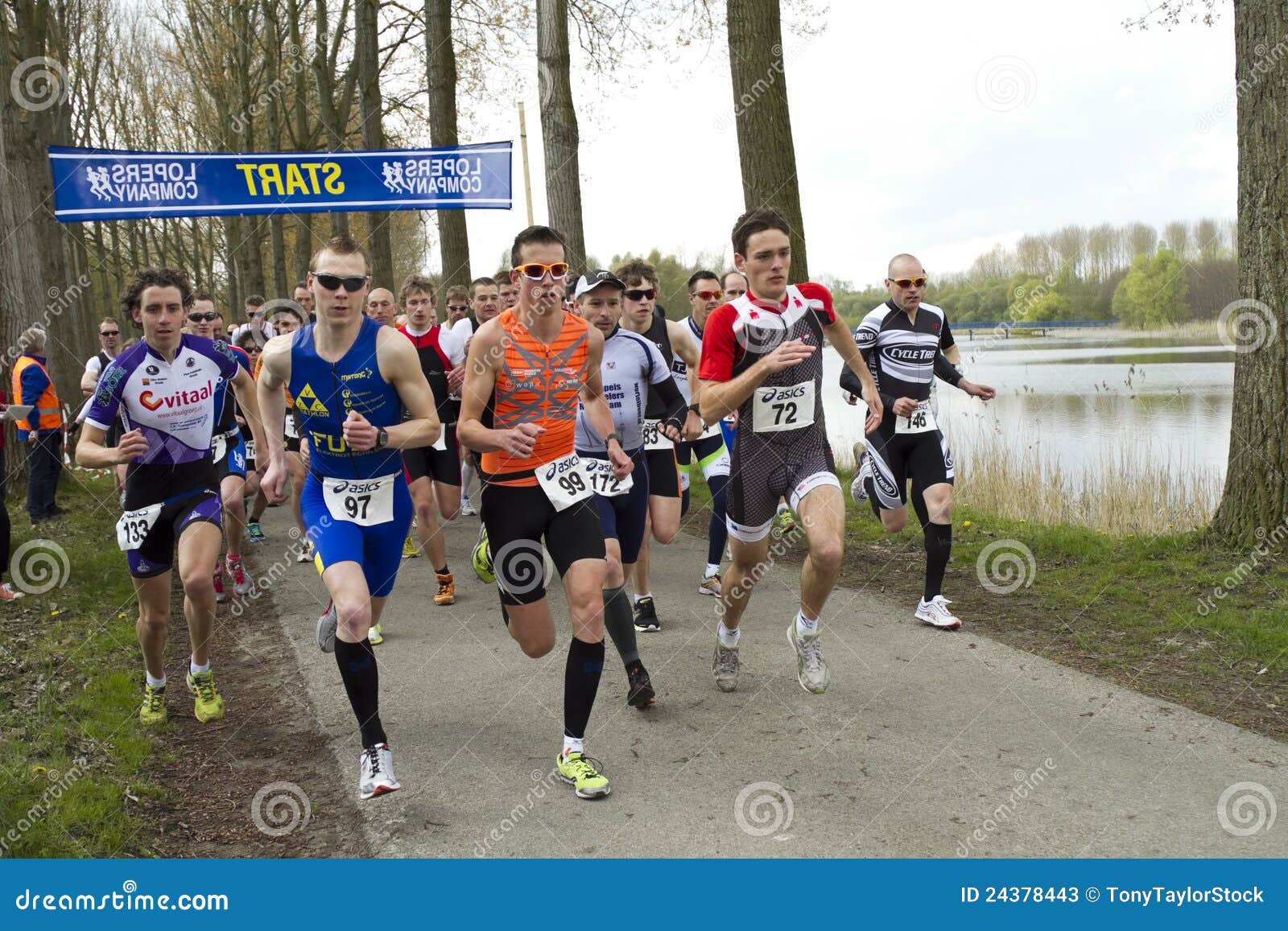 Competitors racing off editorial stock photo. Image of active - 24378443